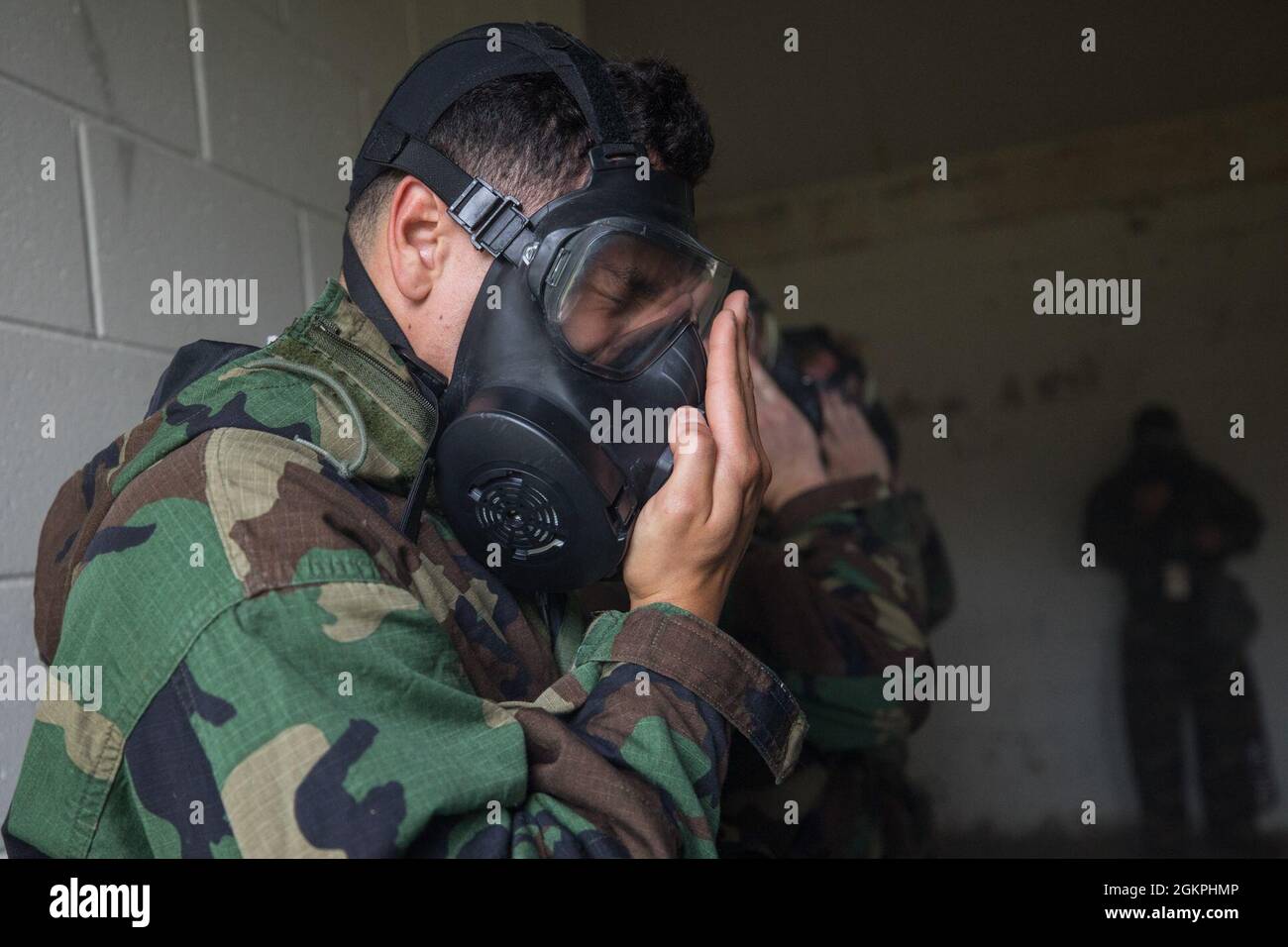 A U.S. Marine with the 22nd Marine Expeditionary Unit clears his M50 ...