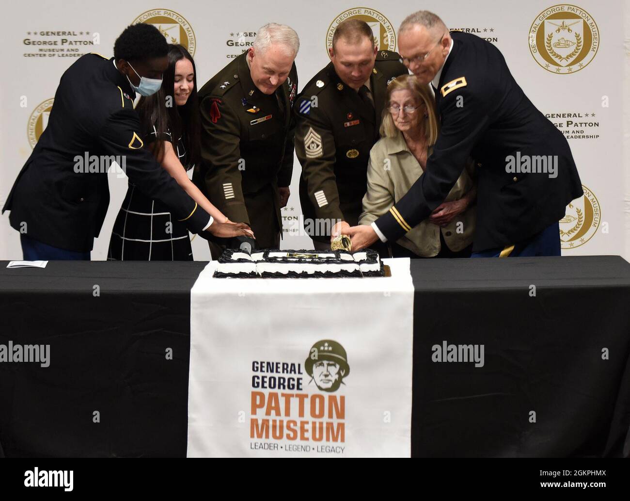Members of the Fort Knox community participate in the official cutting ...