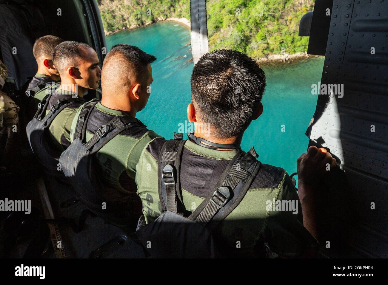 Costa Rican policemen with the Costa Rican police forces prepare to ...