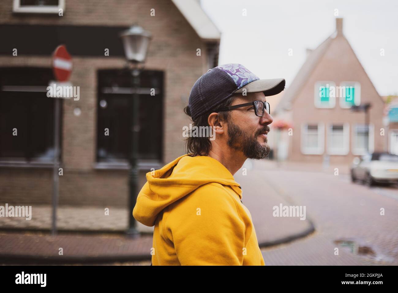 Man on the streets of a Dutch town Stock Photo - Alamy