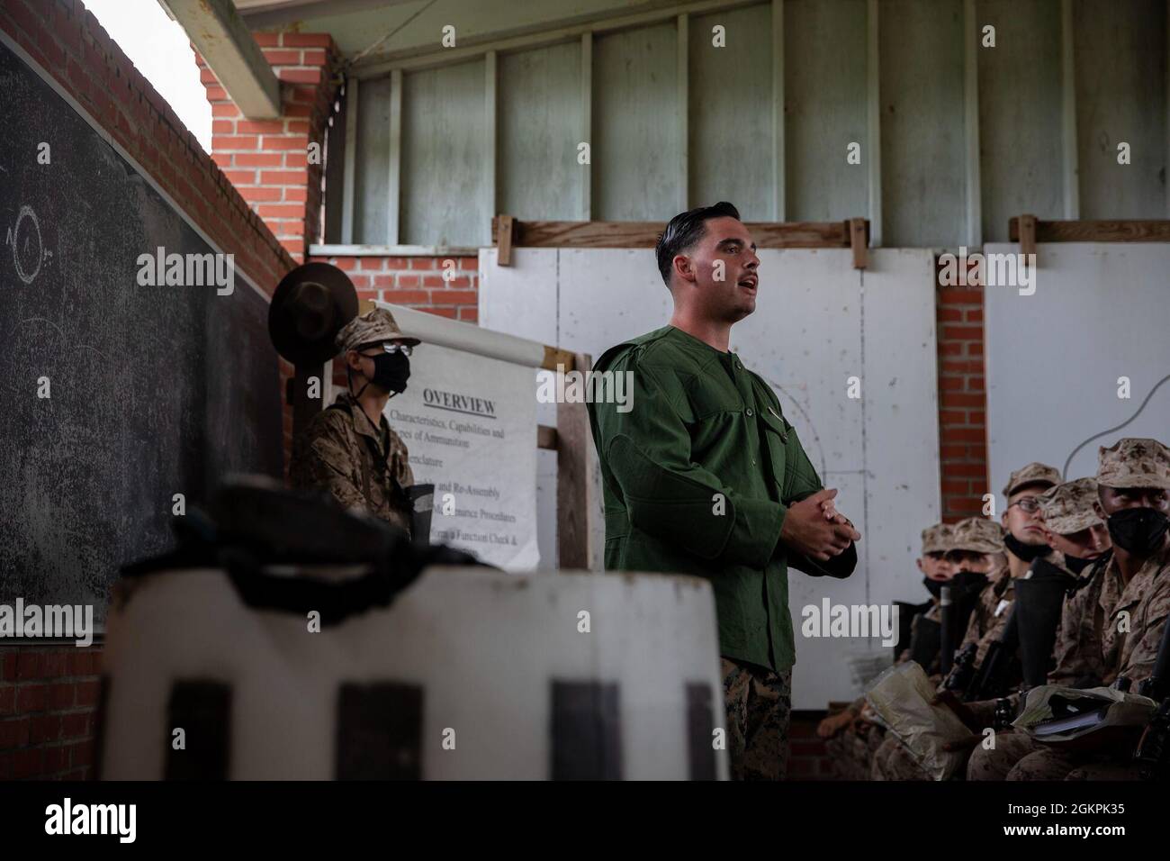 Sgt. Chase R. Day, a Primary Marksmanship Instructor with Weapons and ...