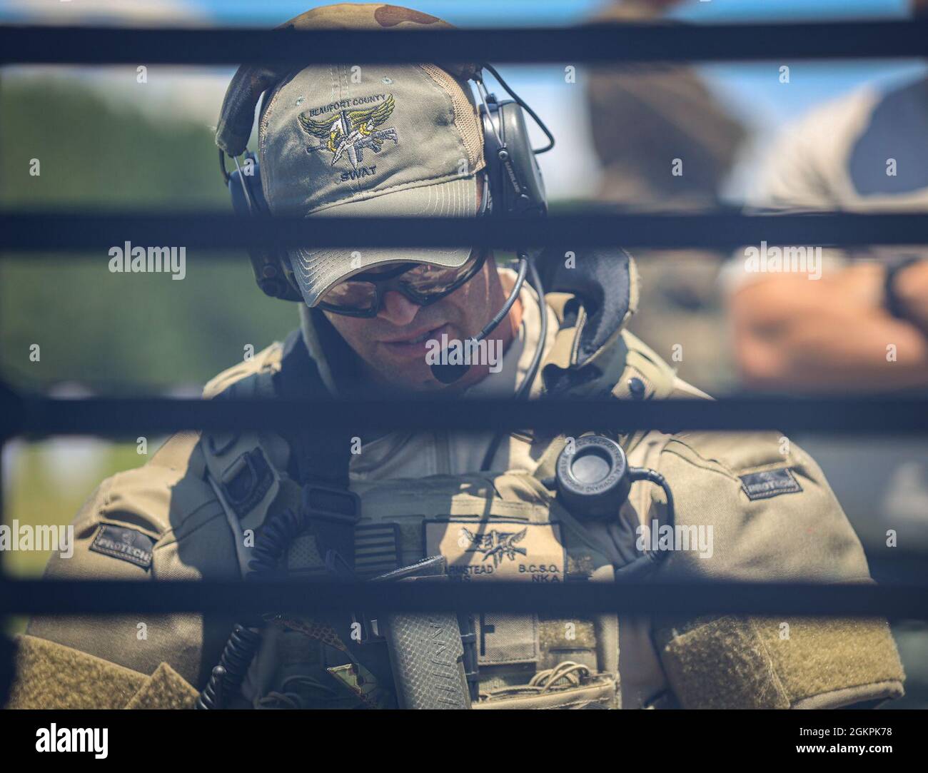 U.S. Marines with the Special Response Team (SRT) and police officers ...