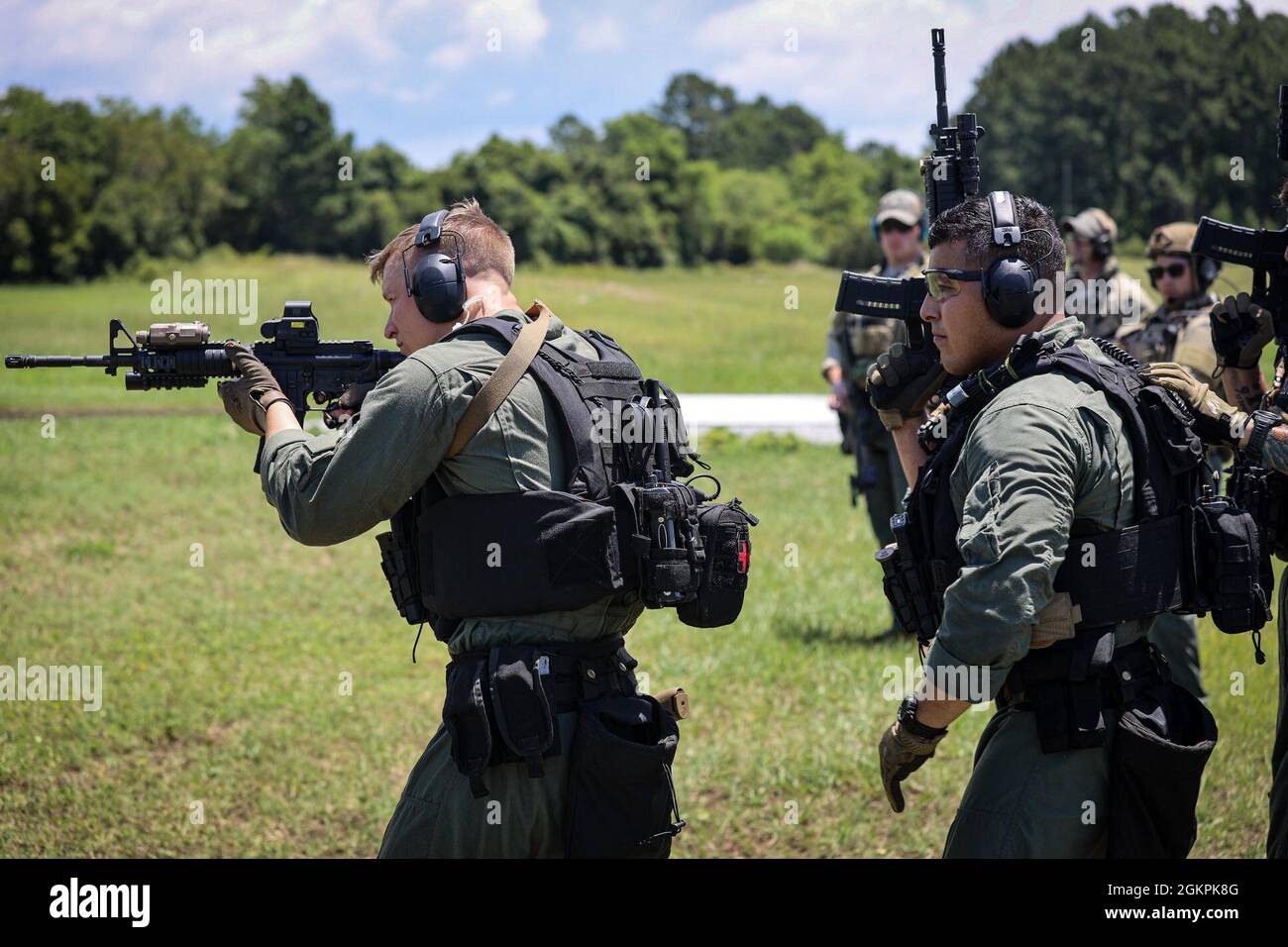 U.S. Marines with the Special Response Team (SRT) and police officers ...