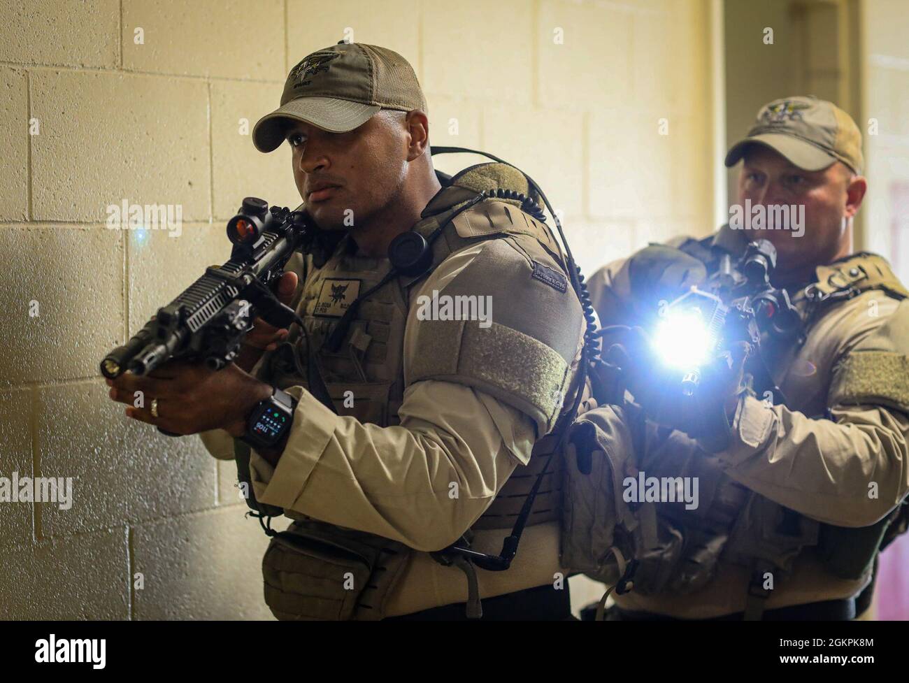 U.S. Marines with the Special Response Team (SRT) and police officers ...