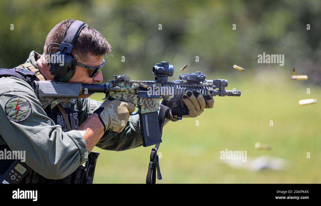 U.S. Marines with the Special Response Team (SRT) and police officers ...