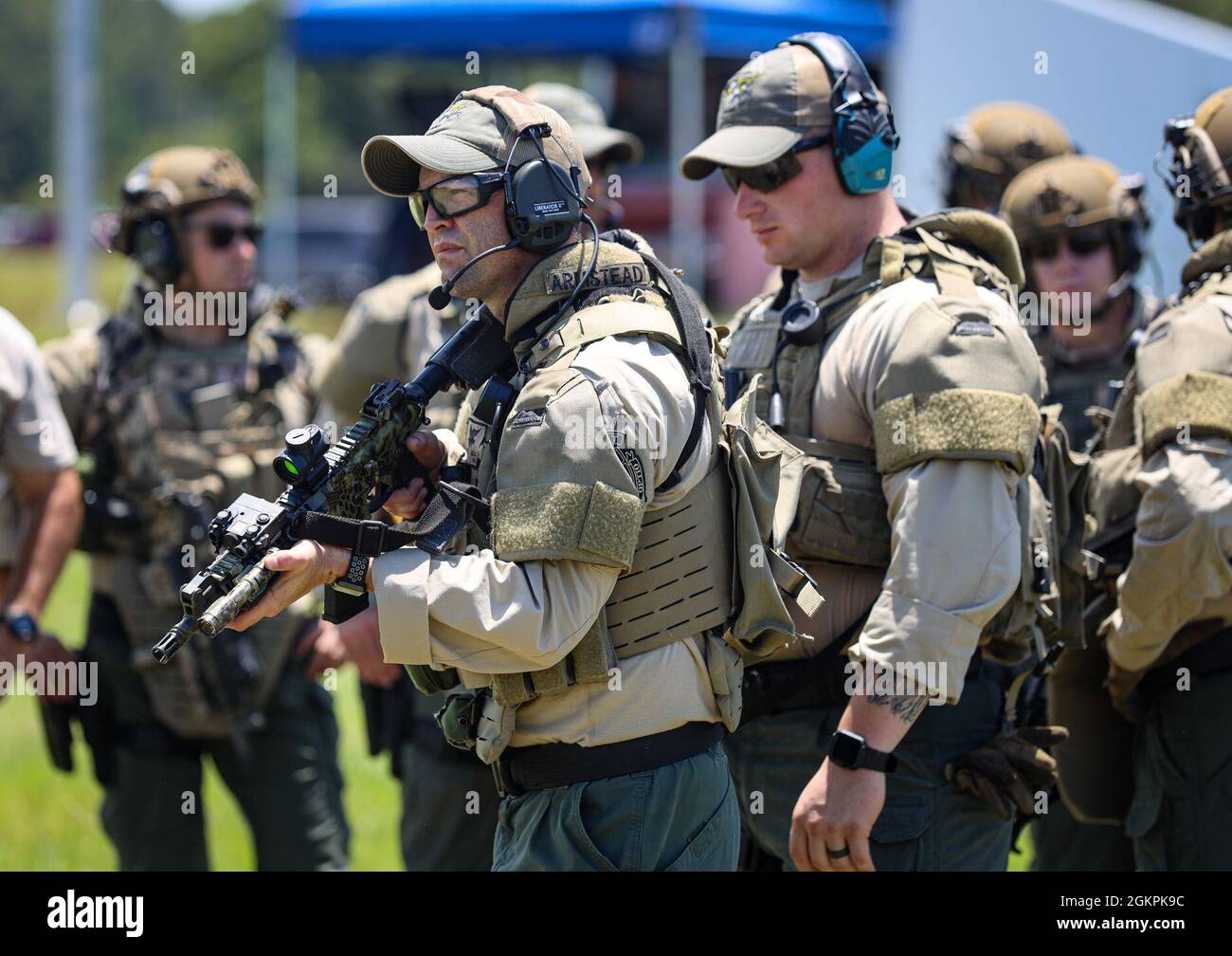 U.S. Marines with the Special Response Team (SRT) and police officers ...