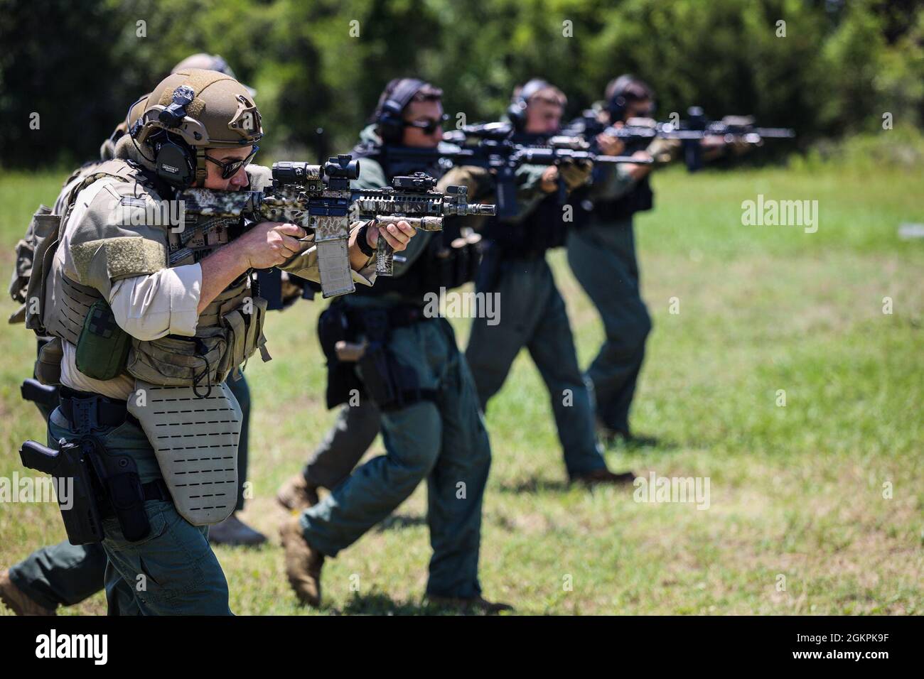 U.S. Marines with the Special Response Team (SRT) and police officers ...