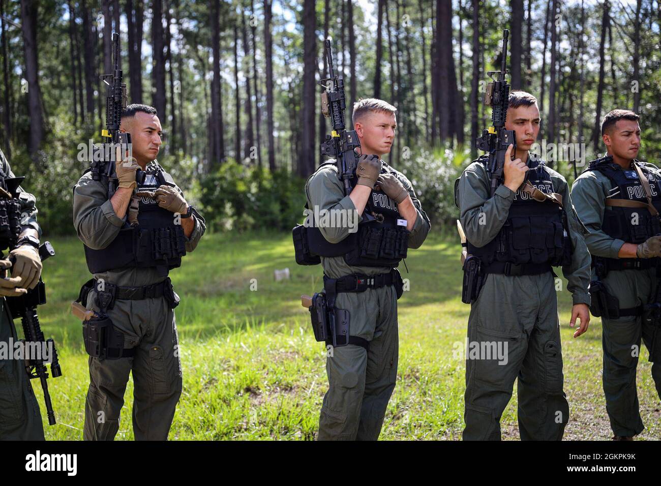 U.S. Marines with the Special Response Team (SRT) and police officers ...