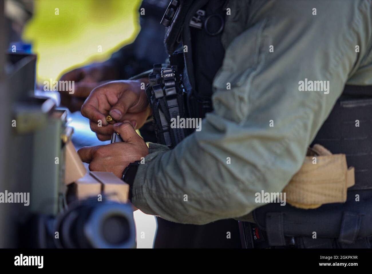 U.S. Marines with the Special Response Team (SRT) and police officers ...