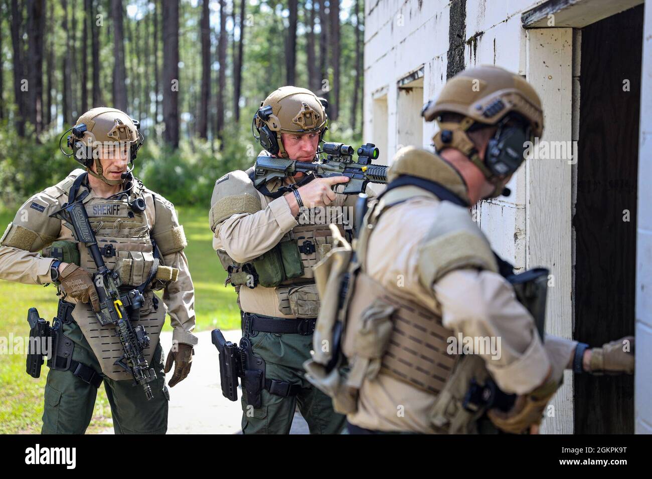 U.S. Marines with the Special Response Team (SRT) and police officers ...