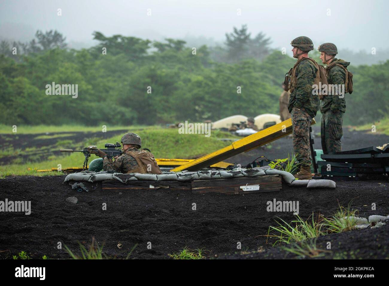 U.S. Marines with 2d Battalion, 2d Marines, conduct a live-fire range ...