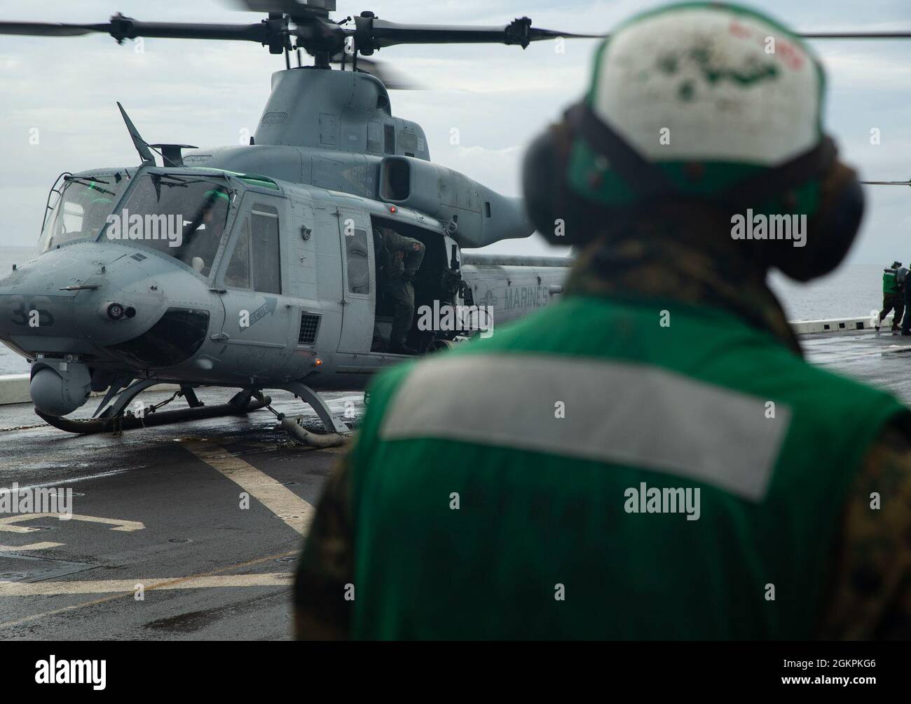 U.S. Navy Aviation Boats Mate Aircraft Handler’s provide assistance ...