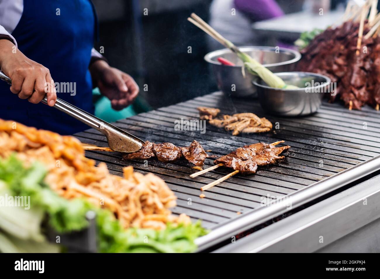 Chef cooking street food Stock Photo - Alamy