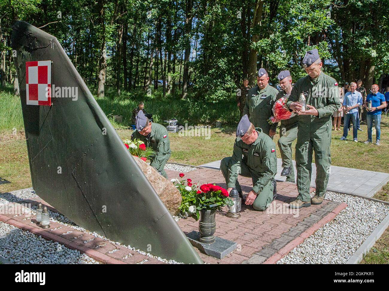 Polish air force officers place flowers at a memorial site before the ...