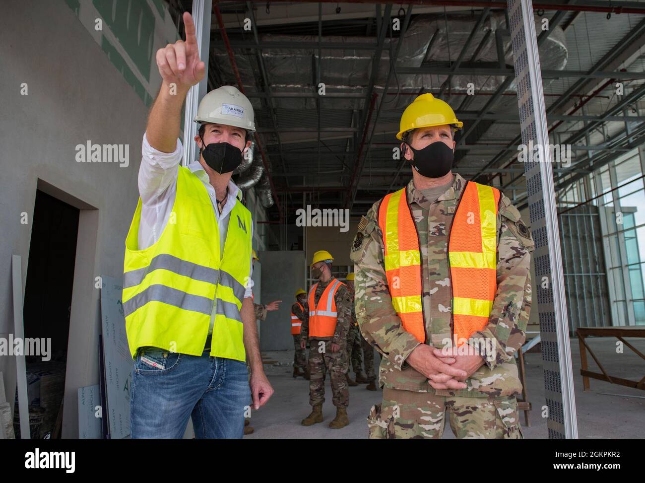 Martin Kamlah, left, director of Munich Airport in Latin America, gives ...
