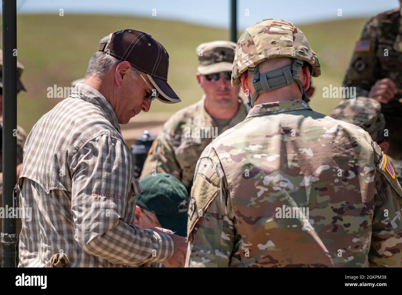 Wyoming Gov. Mark Gordon and his wife, Jennie, Sen. Dan Dockstader, and ...