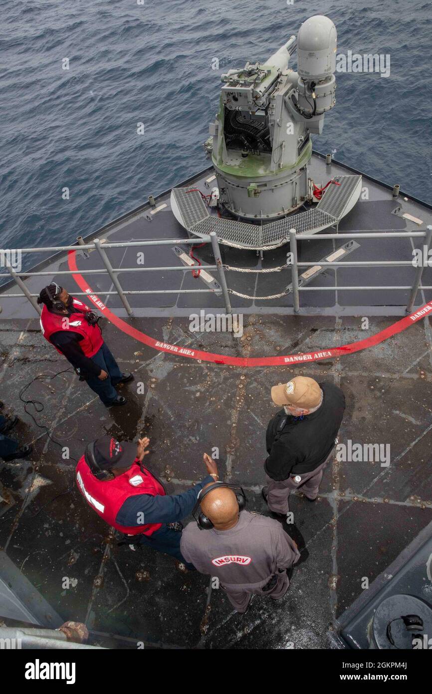 PACIFIC OCEAN (June 14, 2021) Sailors prepare a Mark 38 machine gun ...