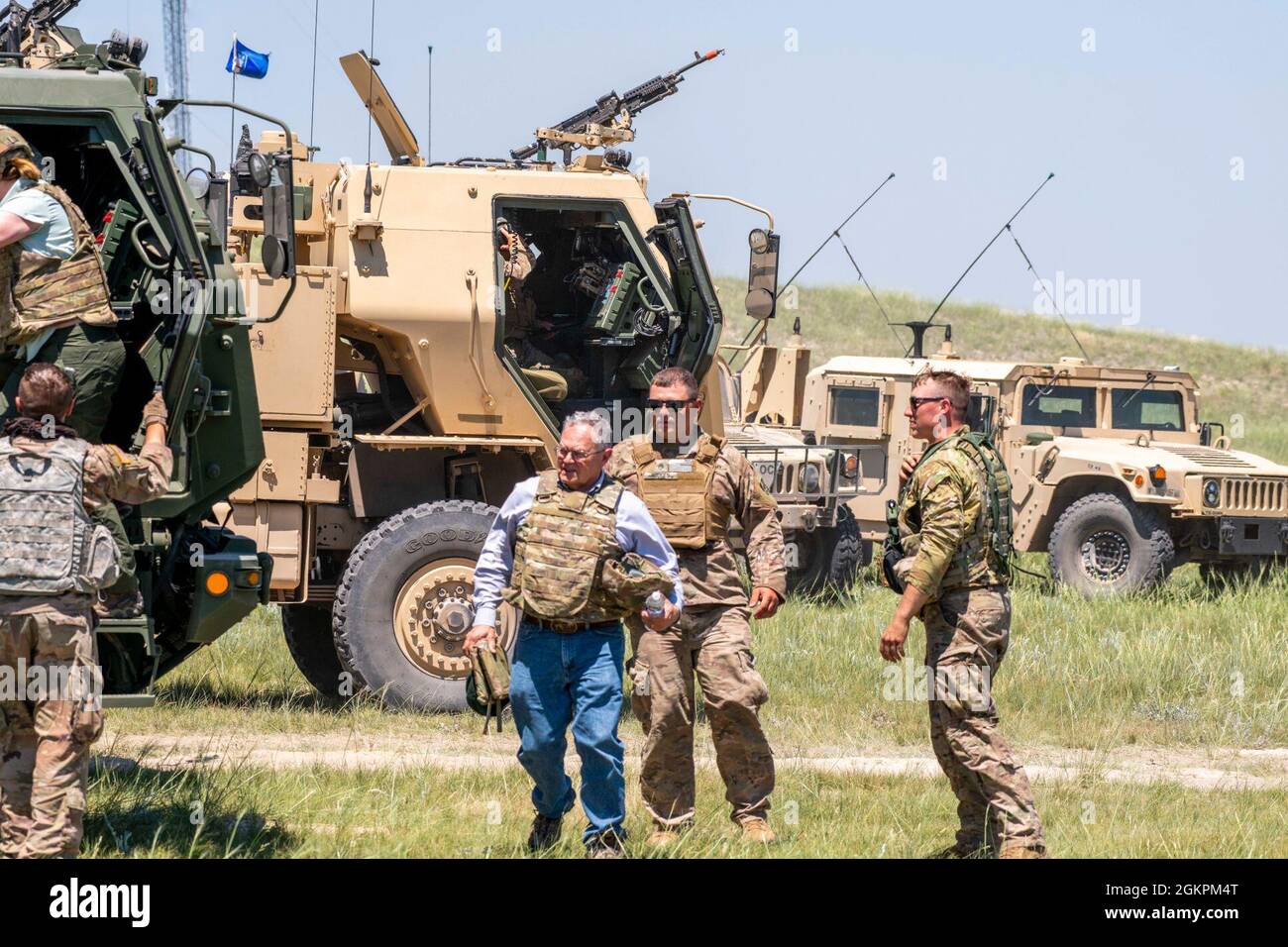 Wyoming Gov. Mark Gordon and his wife, Jennie, Sen. Dan Dockstader, and ...