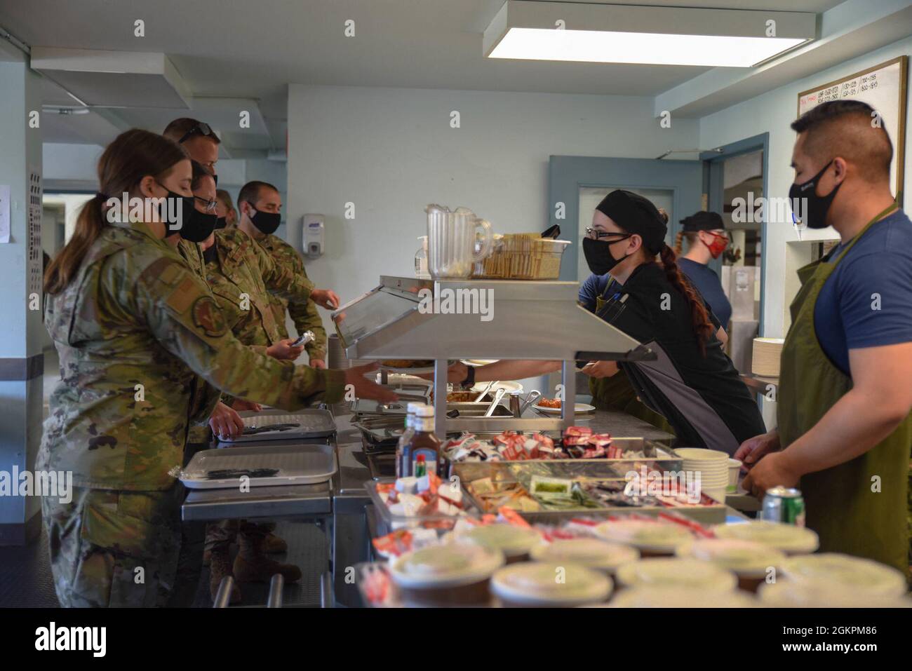 Royal Canadian Air Force Food Services technicians serve lunch to ...