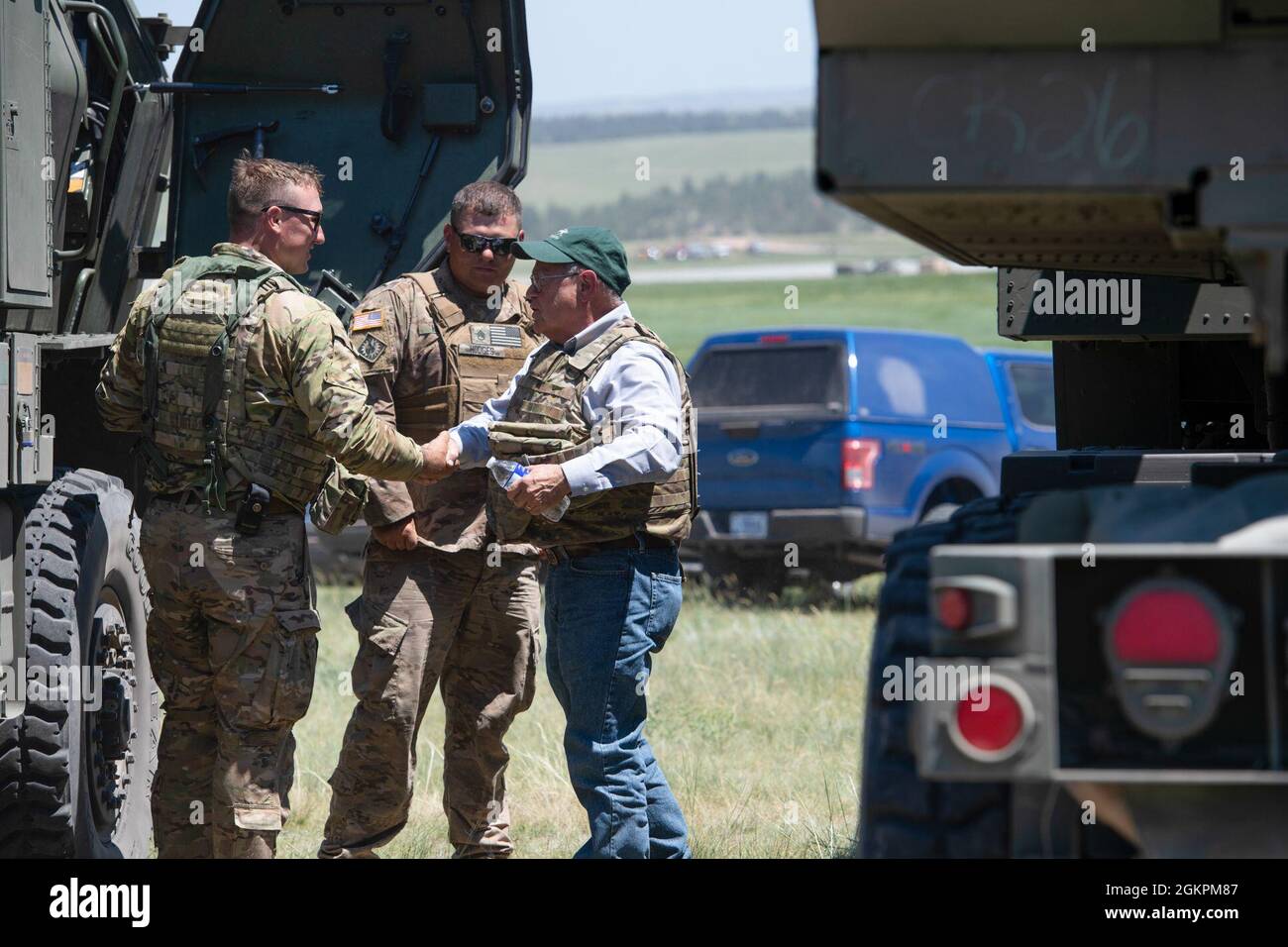 Wyoming Rep. Donald Burkhart exits a High Mobility Artillery Rocket ...
