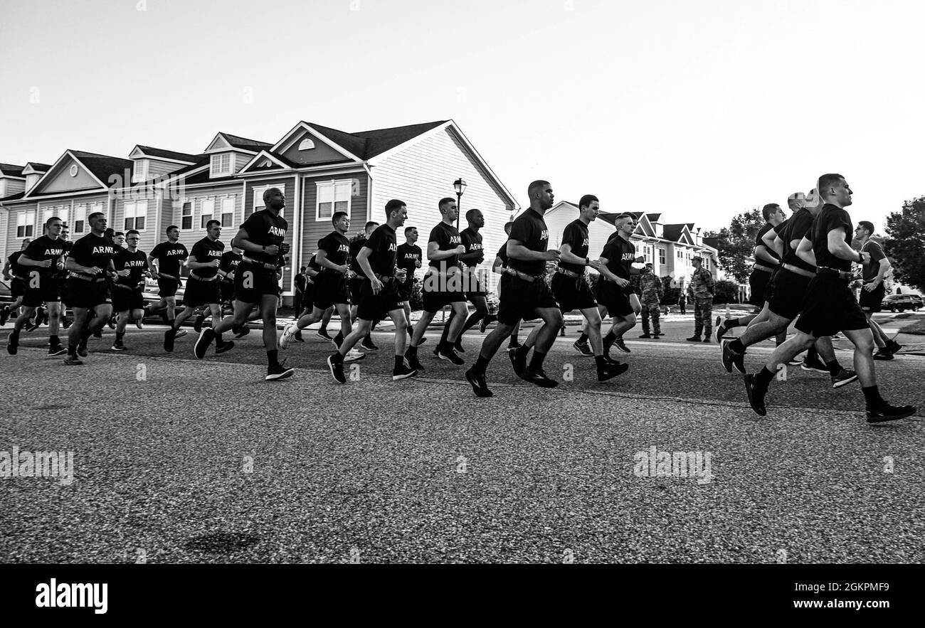 U.S. Soldiers run in formation honoring the birthday of the Army at ...