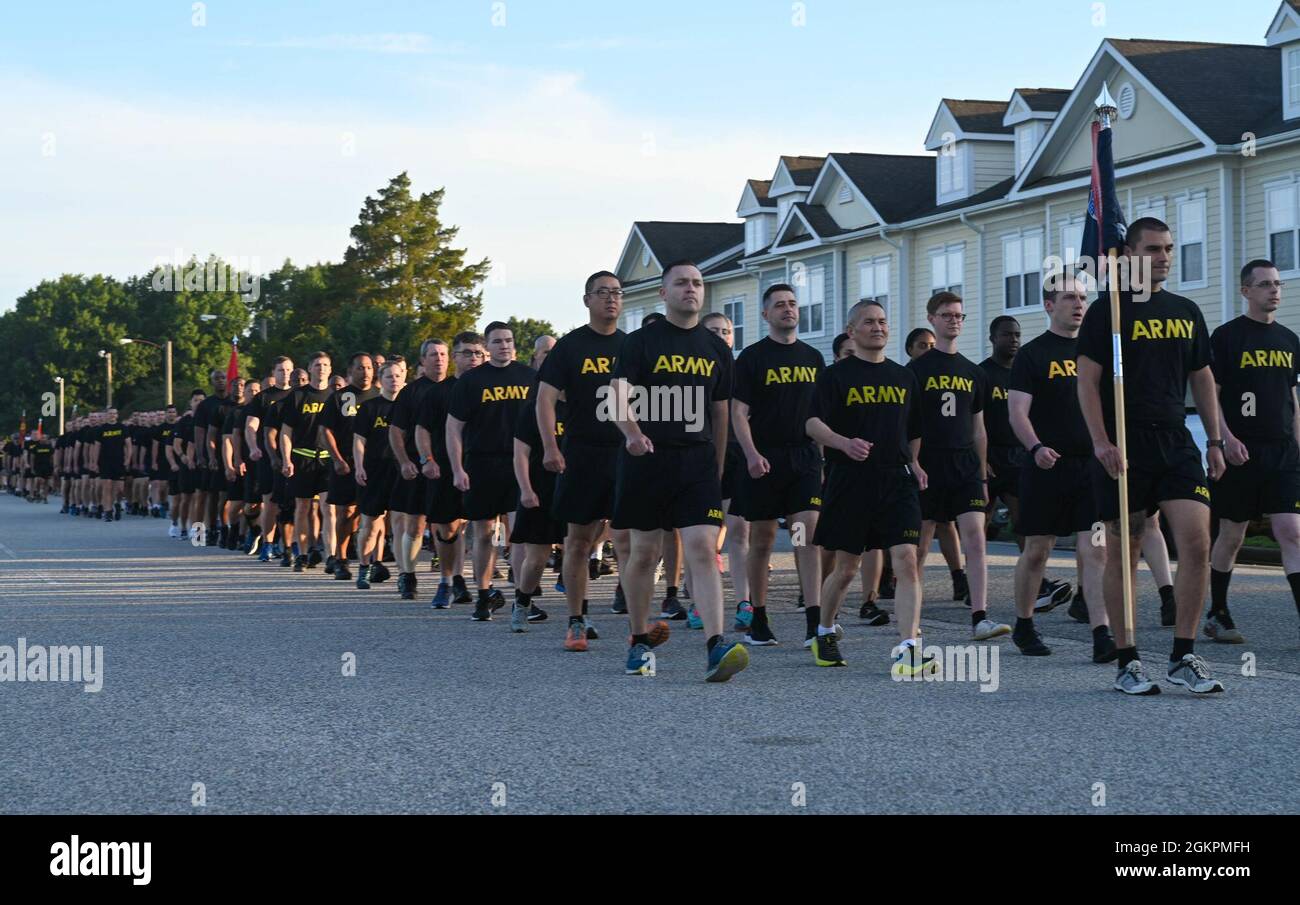 U.S. Soldiers run in formation honoring the birthday of the Army at ...