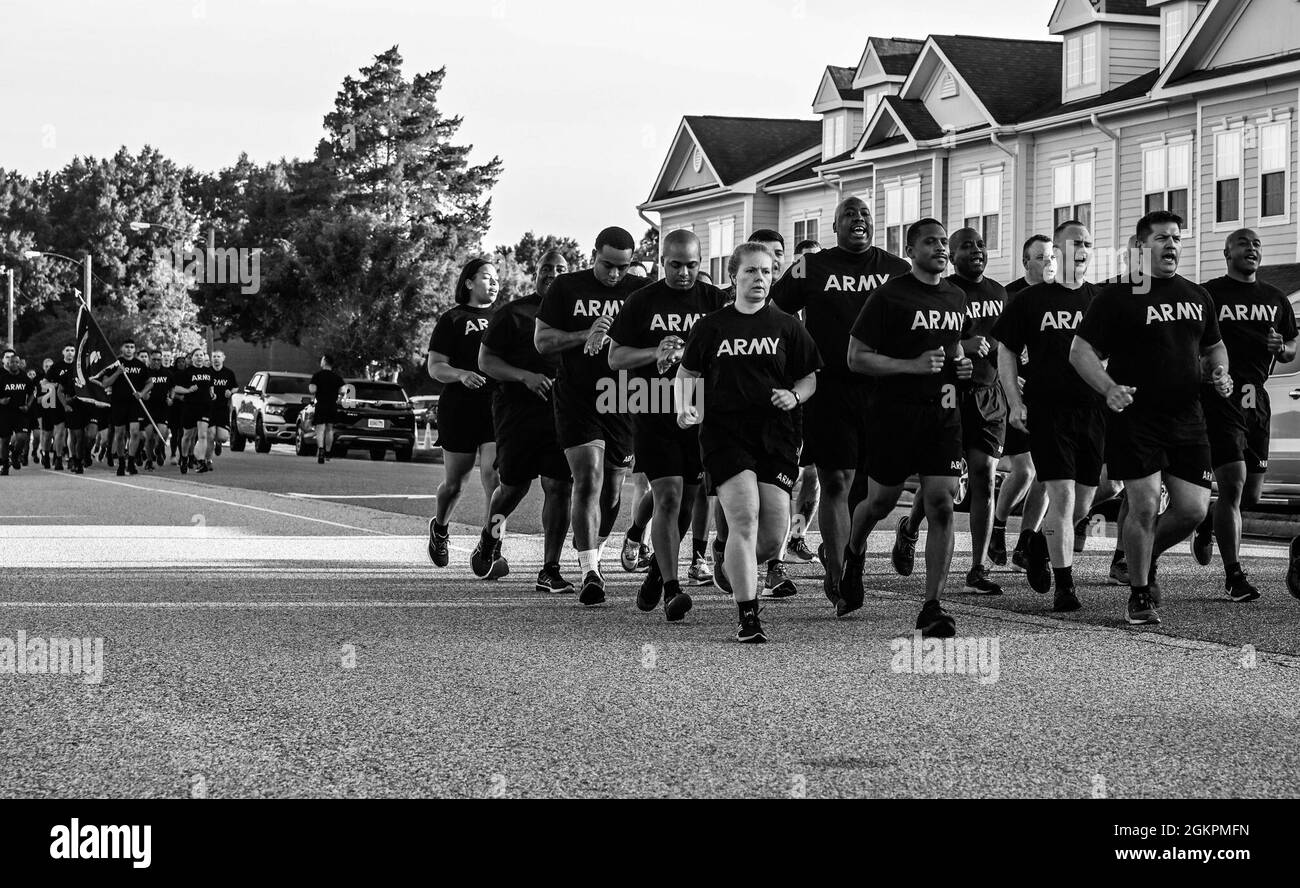 U.S. Soldiers run in formation honoring the birthday of the Army at ...
