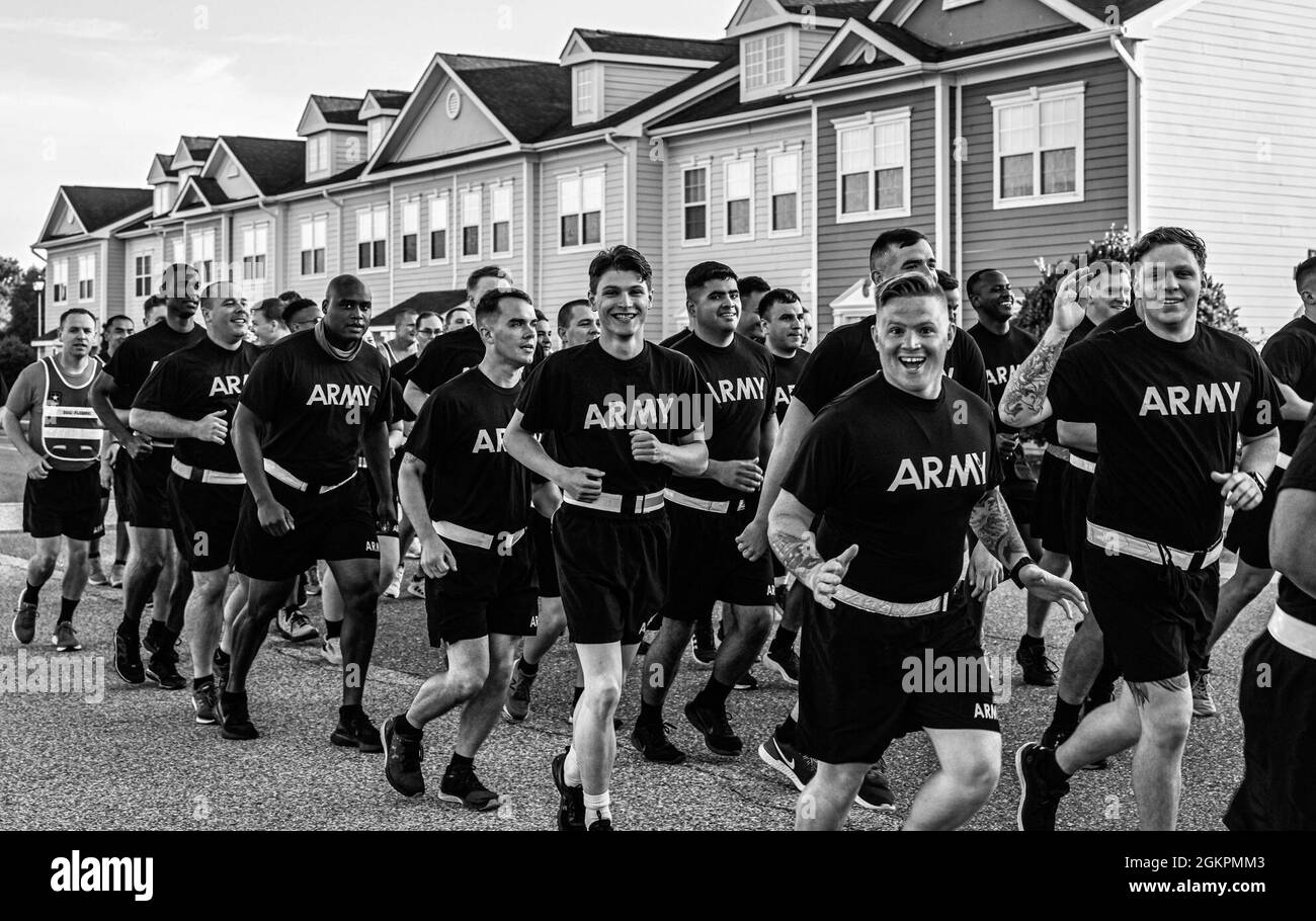 U.S. Soldiers run in formation honoring the birthday of the Army at ...