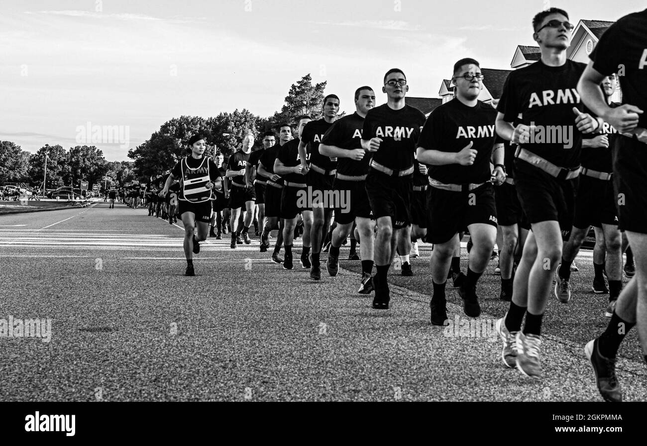 U.S. Soldiers run in formation honoring the birthday of the Army at ...