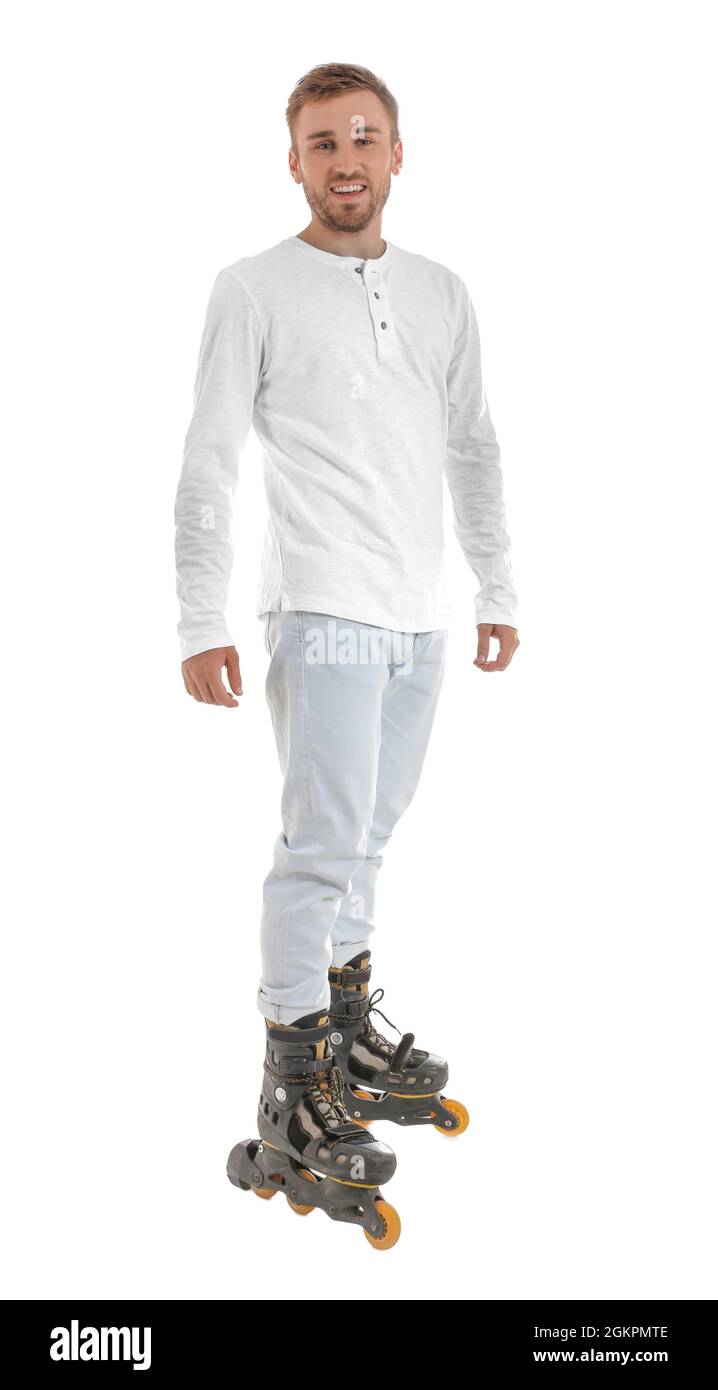 Man on roller skates against white background Stock Photo - Alamy