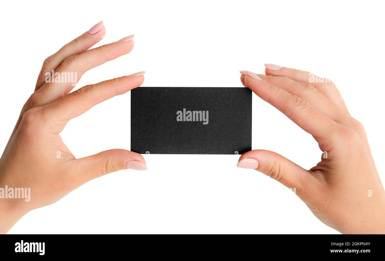 Black business card in girl hands Stock Photo - Alamy