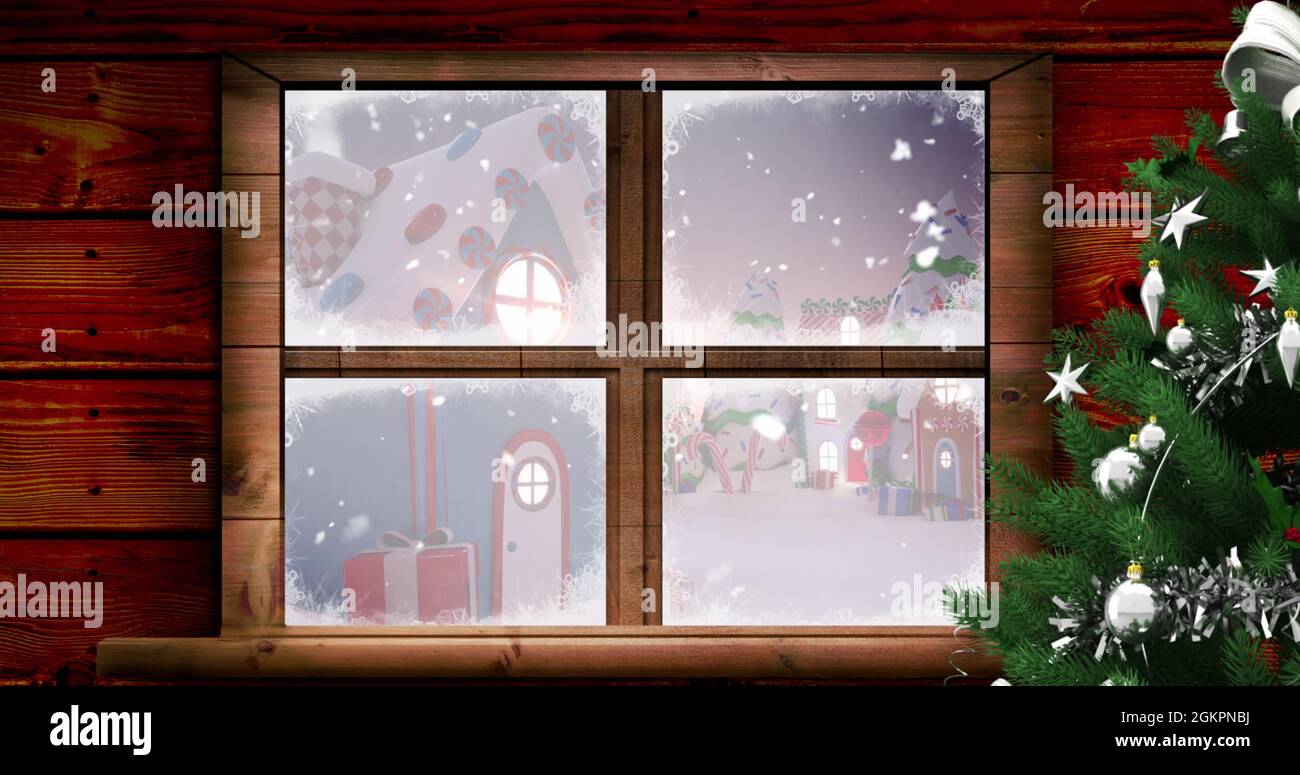 Digital image of wooden window frame against snow falling on houses and ...