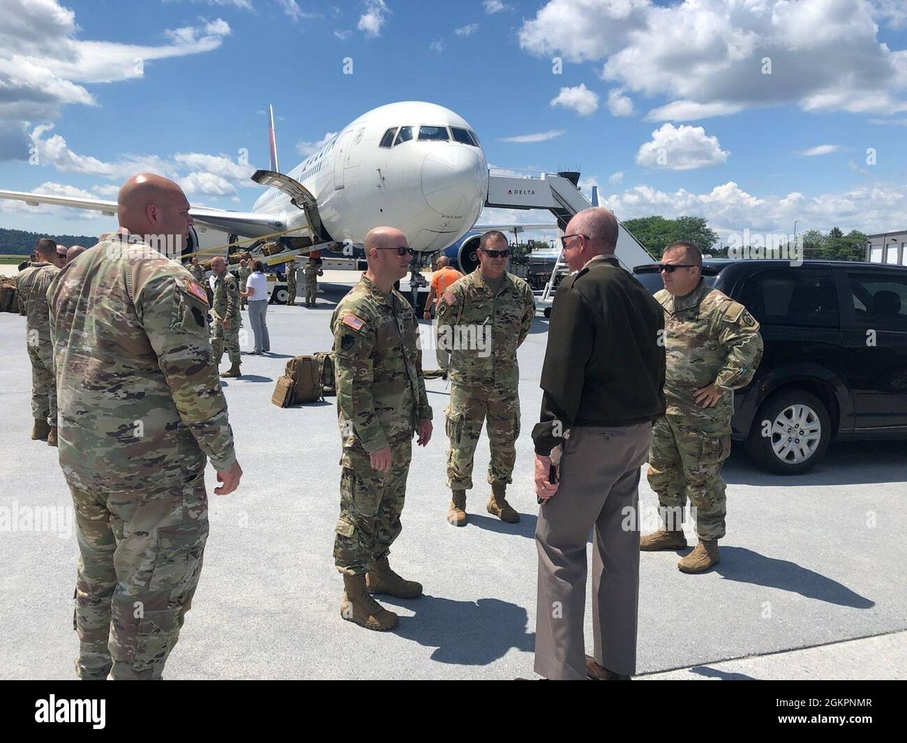 Maj. Gen. Mark Schindler, second from right, acting adjutant general of ...
