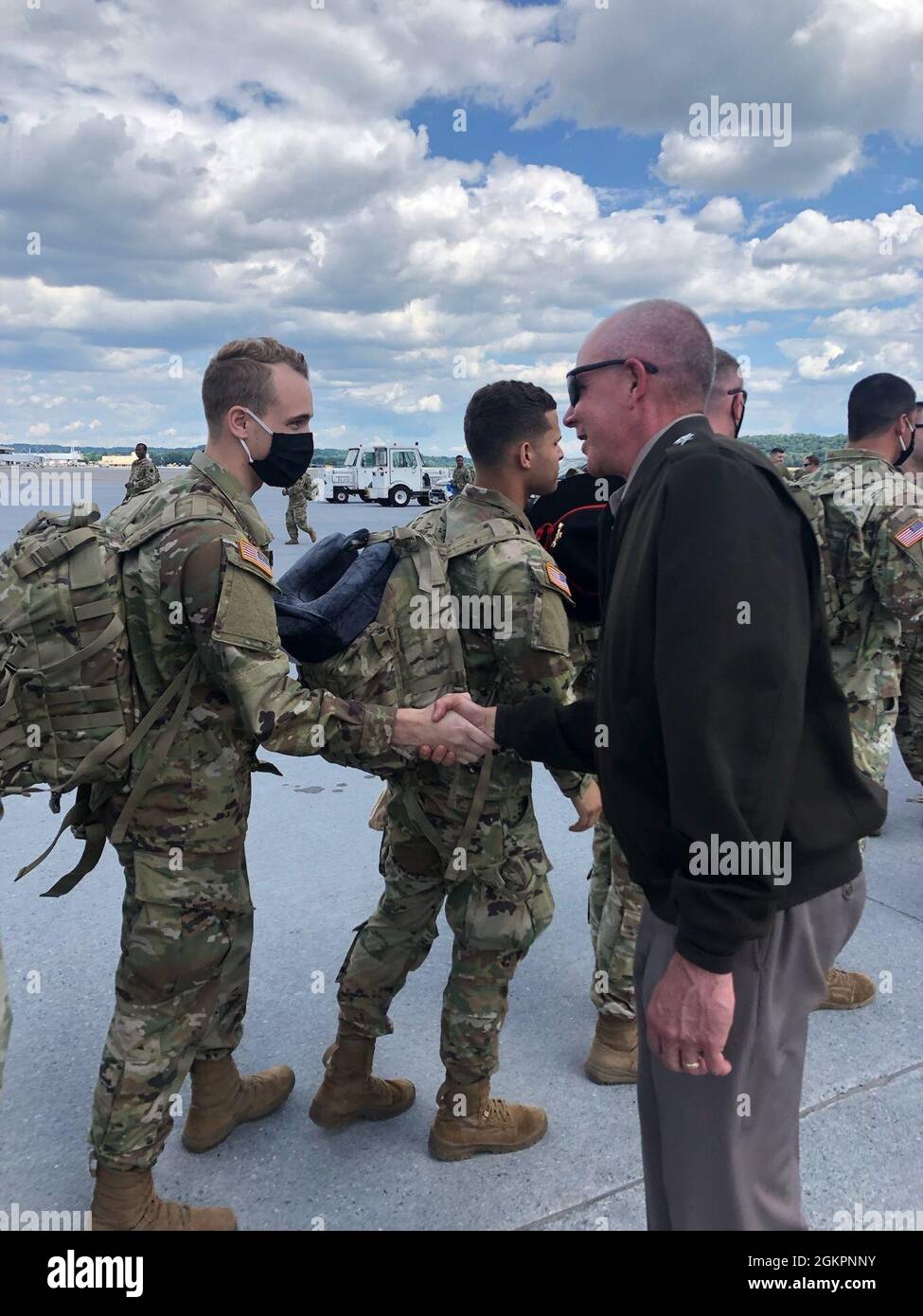 Maj. Gen. Mark Schindler, right, acting adjutant general of ...
