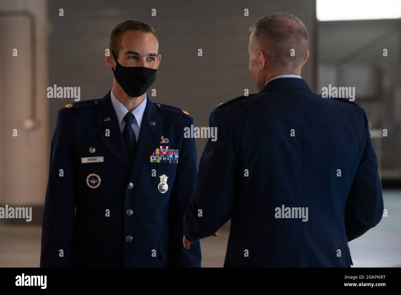 U.S. Air Force Maj. Daniel Merkh, left, 423rd Security Forces Squadron incoming commander ...