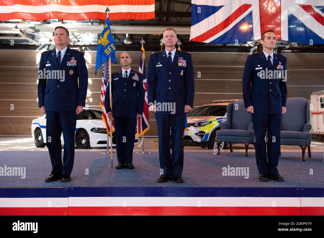 U.S. Air Force Lt. Col. Brian Mack, center, 423rd Security Forces Squadron outgoing commander ...