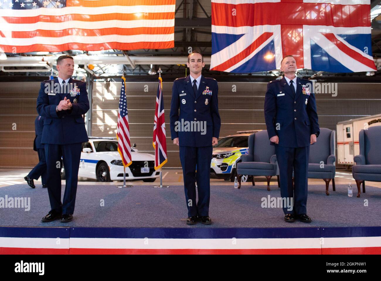 U.S. Air Force Maj. Daniel Merkh, right, 423rd Security Forces Squadron incoming commander ...
