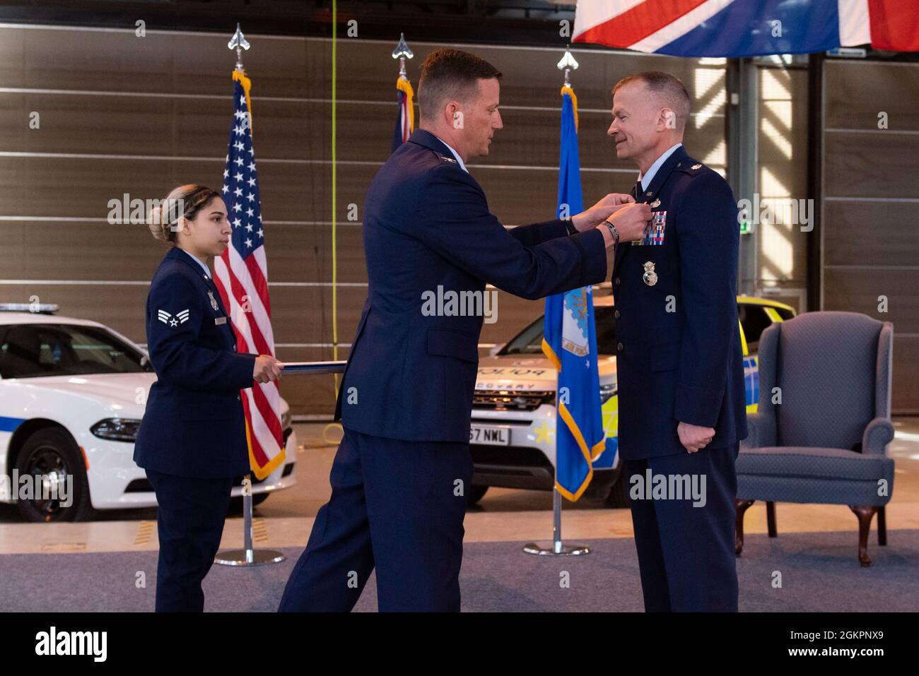 U.S. Air Force Lt. Col. Brian Mack, right, 423rd Security Forces Squadron outgoing commander ...