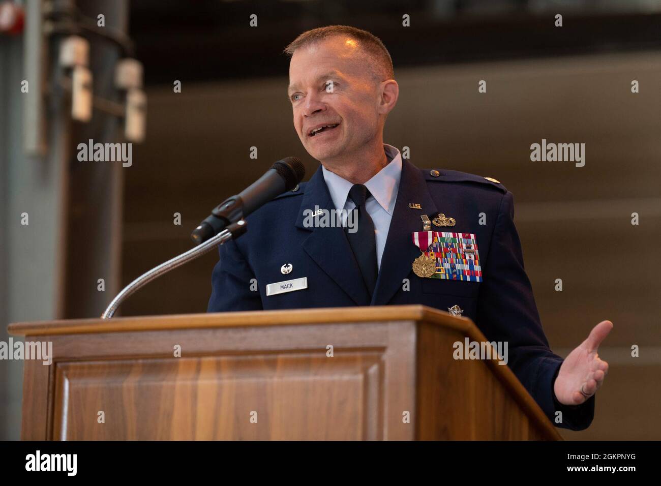 U.S. Air Force Lt. Col. Brian Mack, 423rd Security Forces Squadron outgoing commander, speaks ...