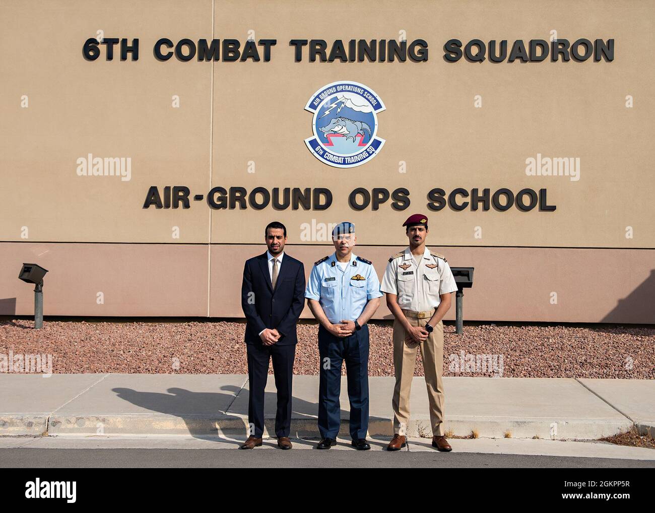 Members of the Qatar Emiri Air Force stand for a photo in front of the ...