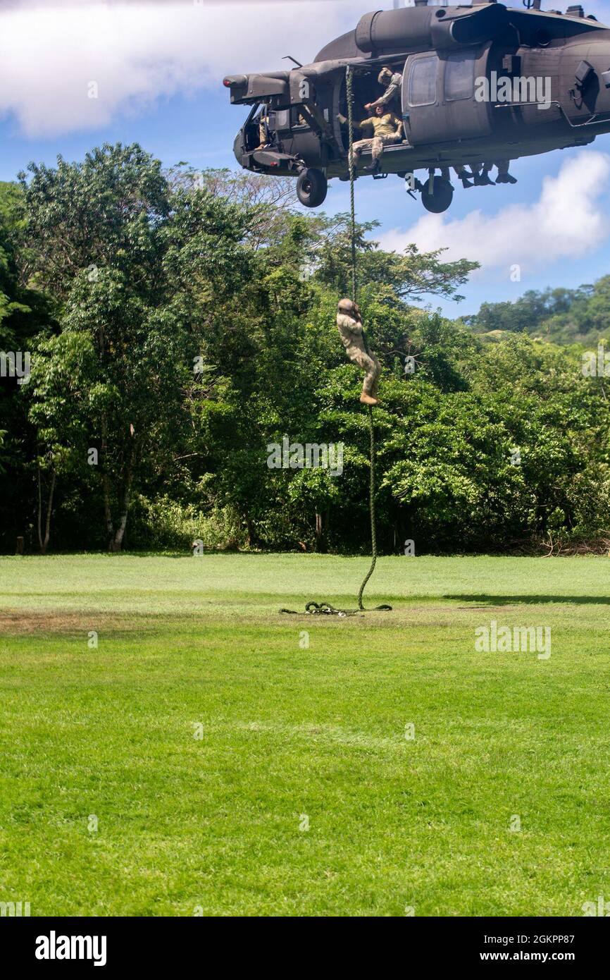 A member of the Costa Rican Police Forces fast ropes out of a U.S. Army ...