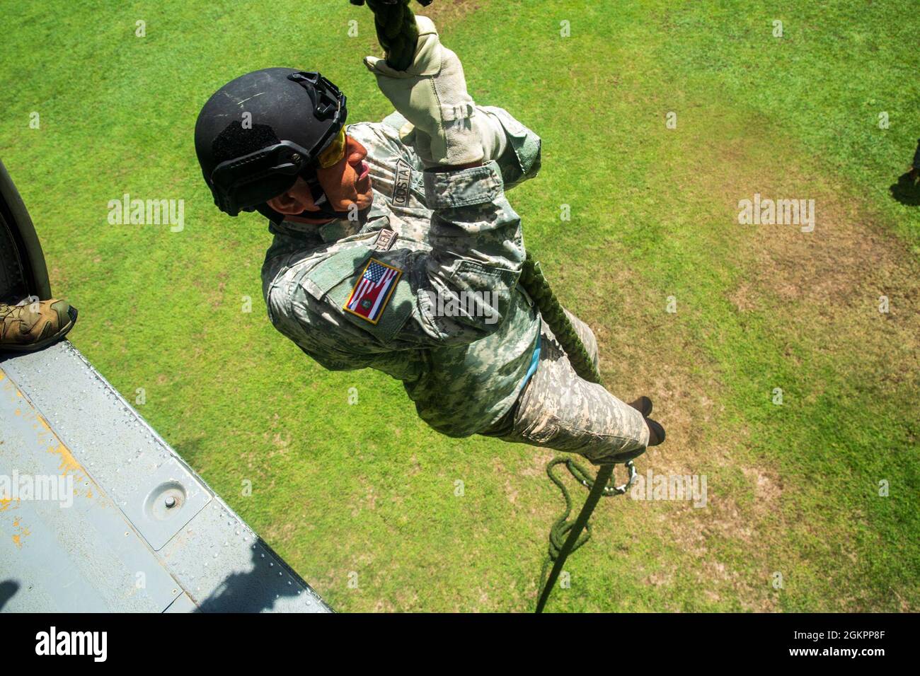 A member of the Costa Rican Police Forces fast ropes out of a U.S. Army ...