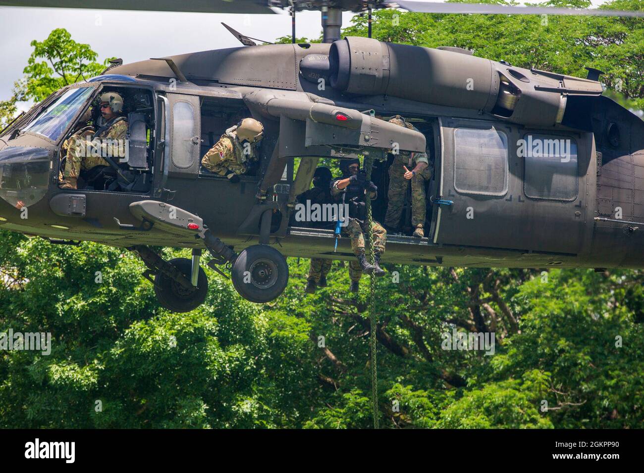 Members from the Costa Rican Police Forces prepare to jump out of a U.S ...