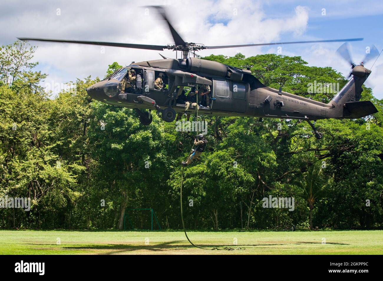 A member of the Costa Rican Police Forces fast ropes out of a U.S. Army ...