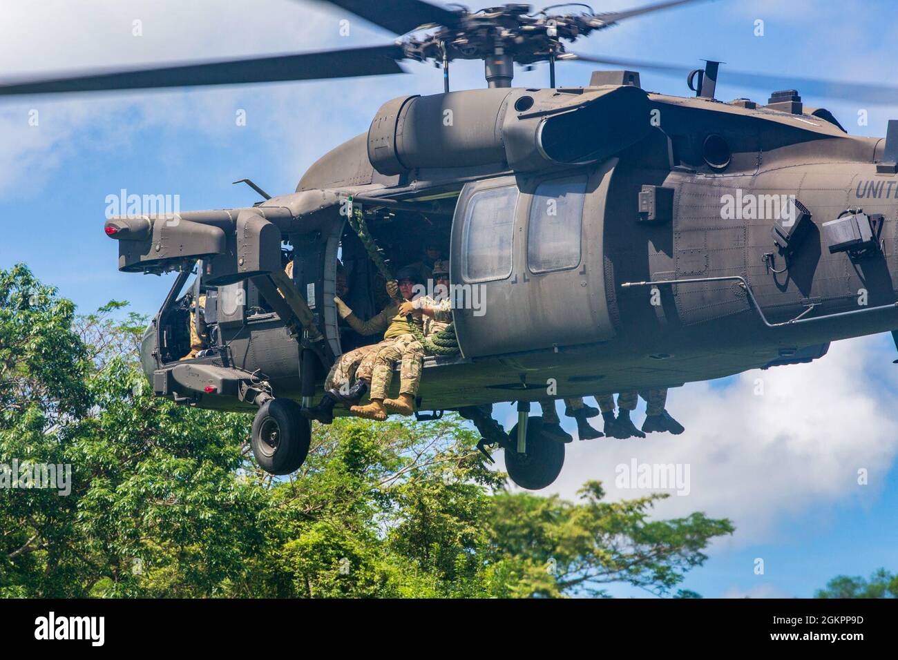 Members from the Costa Rican Police Forces prepare to jump out of a U.S ...