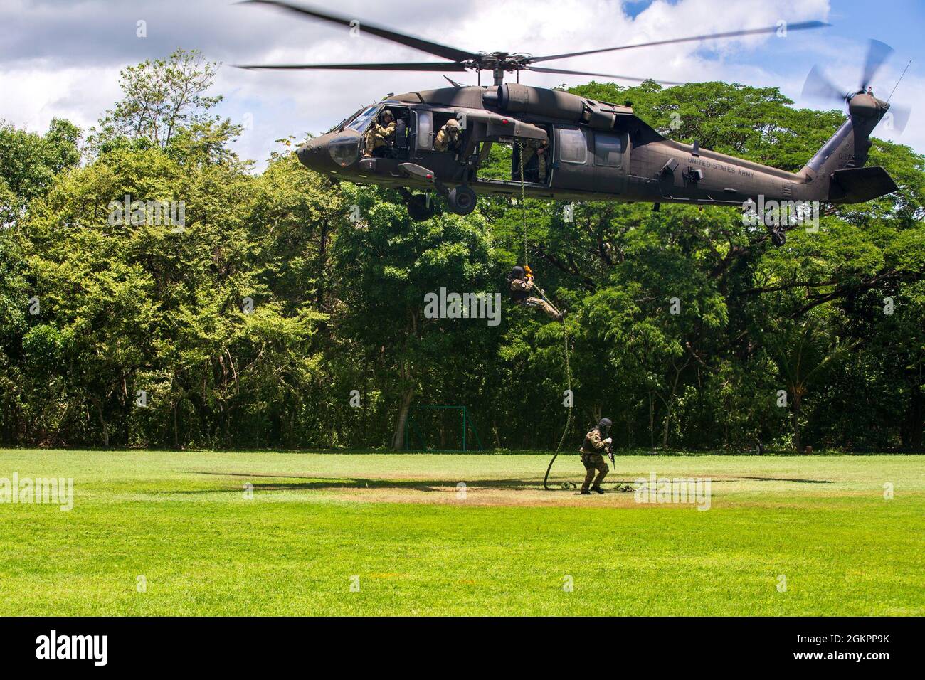 A member of the Costa Rican Police Forces fast ropes out of a U.S. Army ...