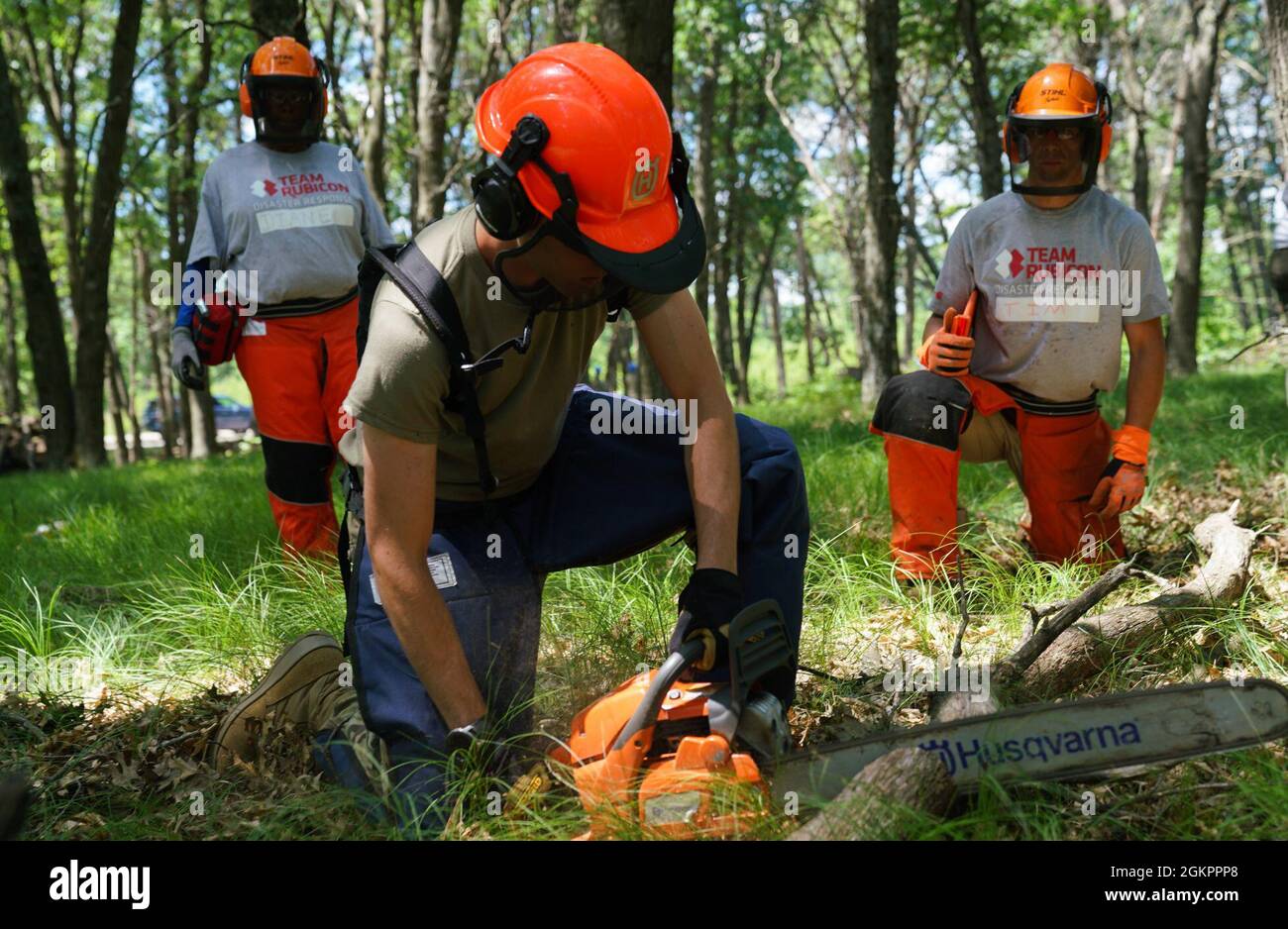 U.S. Air Force Airman 1st Class Stormi Hankins, center, electrical ...