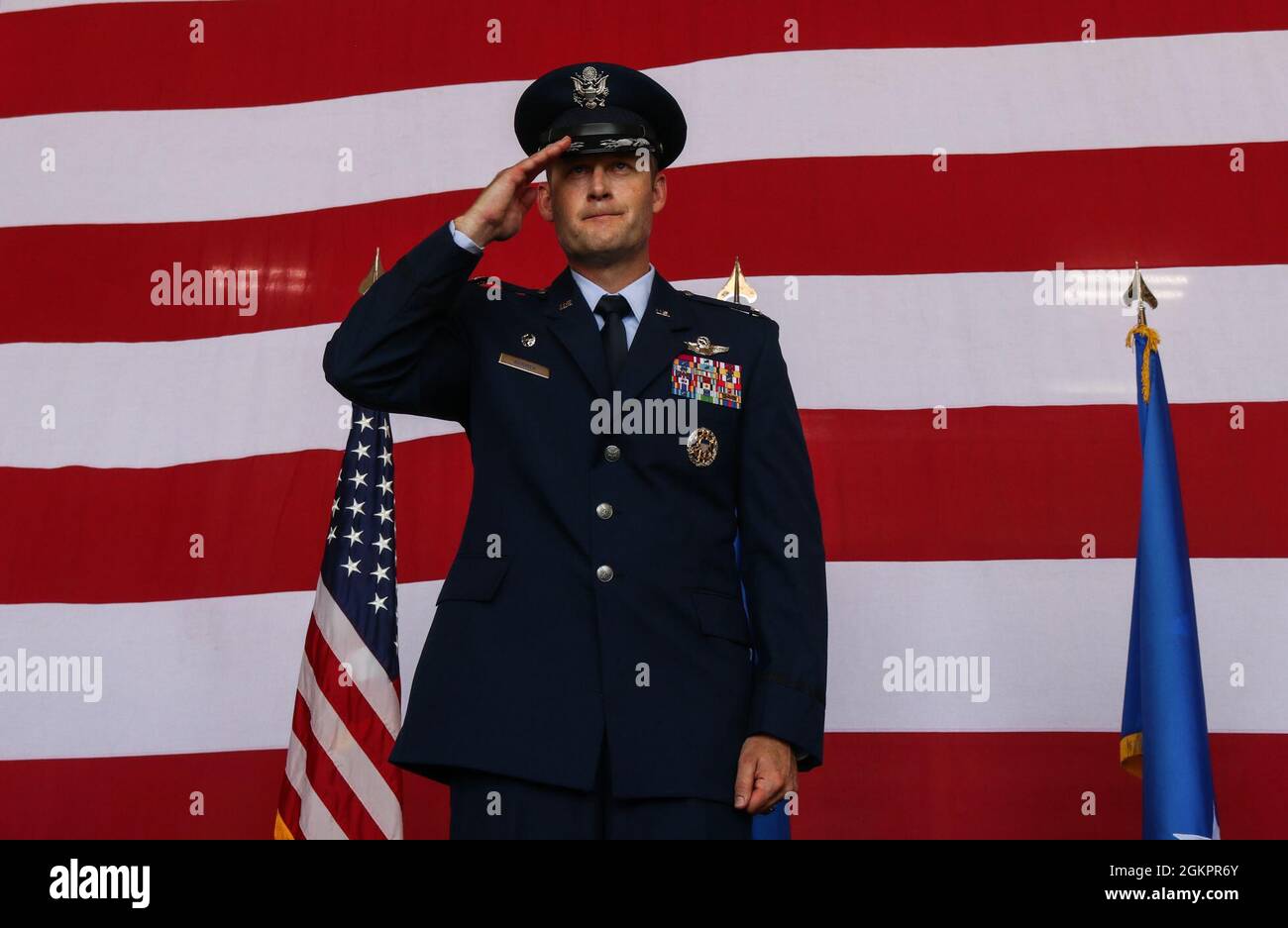 Col. Joseph Kramer, 7th Bomb Wing commander, renders his first salute ...