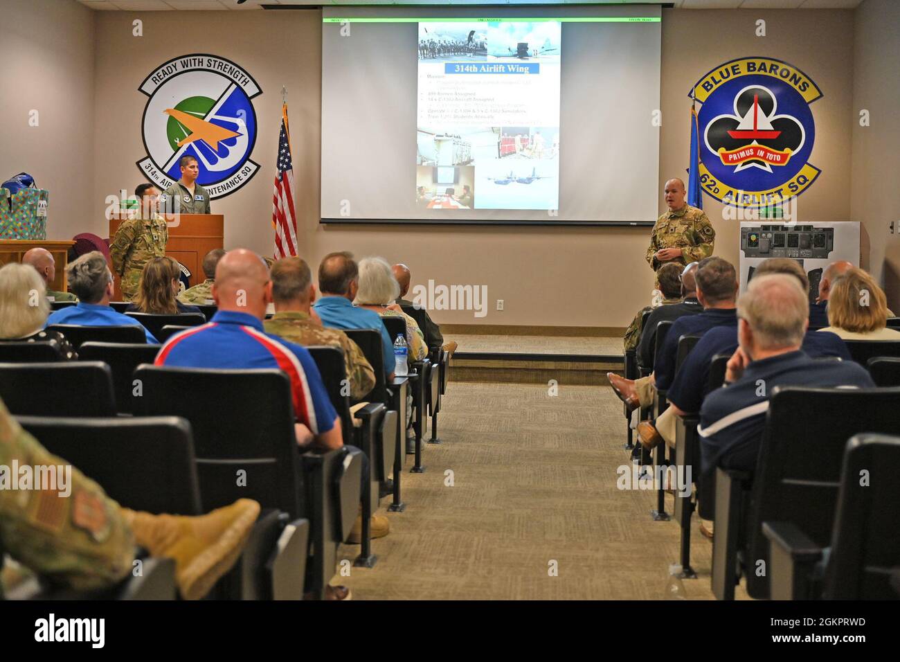 Lt. Col. Matt Wunderlich, 62d Airlift Squadron commander, briefs Air ...