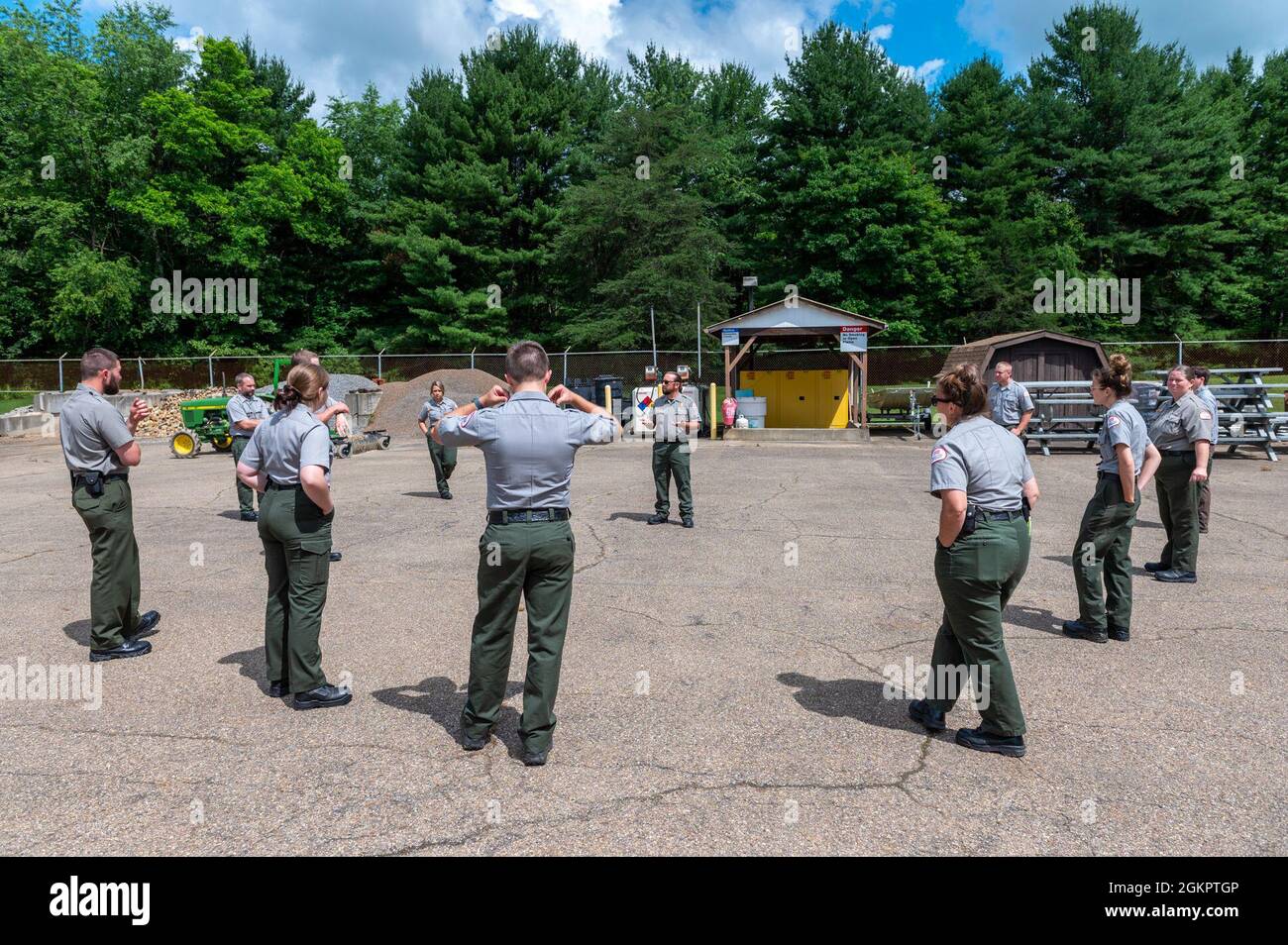 Scott Hannah, natural resource specialist, teaches a class to a group ...